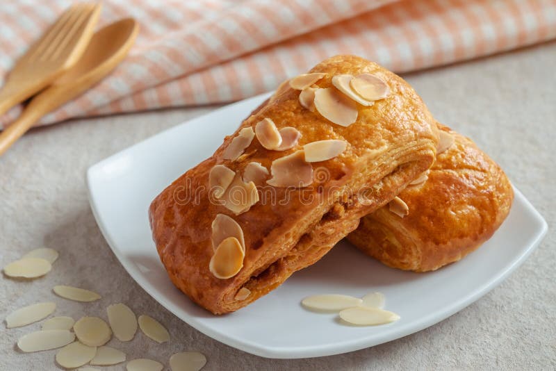 Almond Danish Pastry on White Plate Stock Photo - Image of dish, puff ...