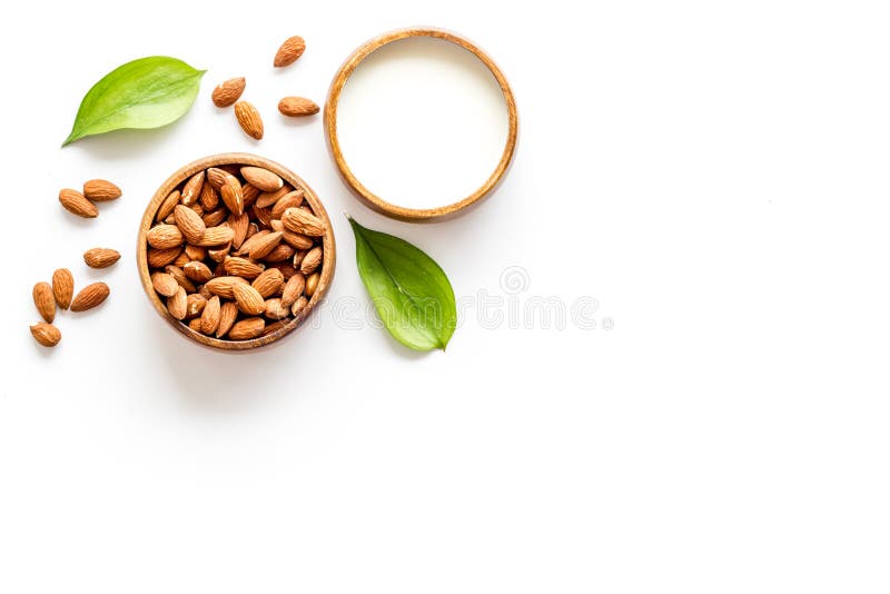 Almond Milk Near Nuts on White Background Top-down Copy Space Stock ...