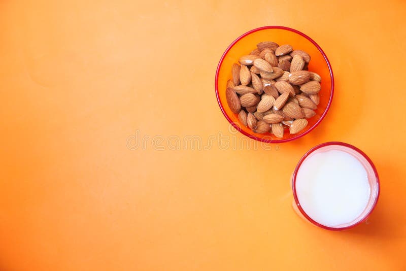 Almond Nut and Milk on Color Background , Top Down Stock Image - Image ...