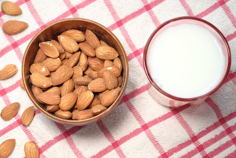 Almond Nut and Milk on Table Top Down Stock Photo - Image of roasted ...