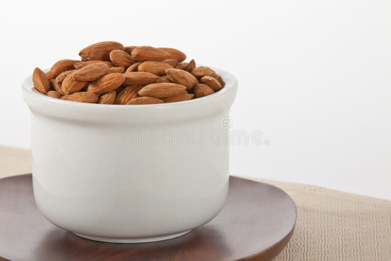 Almonds in a bowl stock image. Image of almond, fresh - 17371477