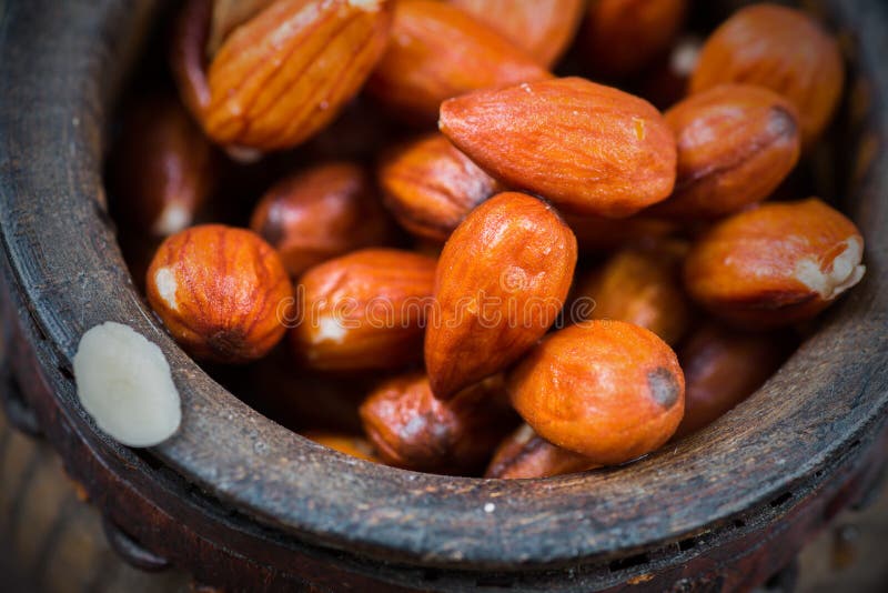 Almonds in bowl,closeup. stock image. Image of glow - 106373609