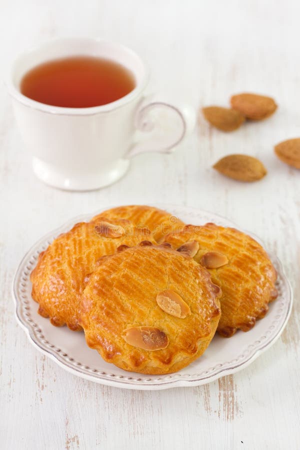 Almonds cookies with tea stock image. Image of drink - 40533781