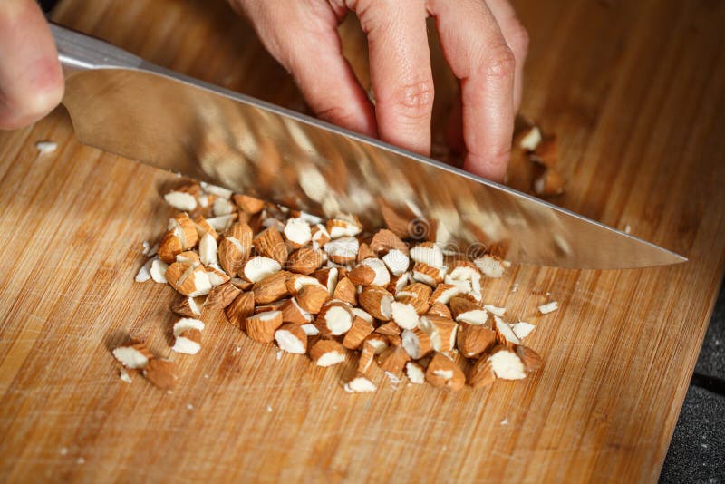 Almonds cutting knife stock image. Image of domestic - 86309931