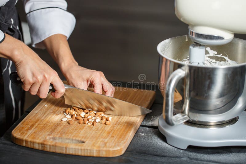 Almonds cutting knife stock image. Image of table, bamboo - 86310171