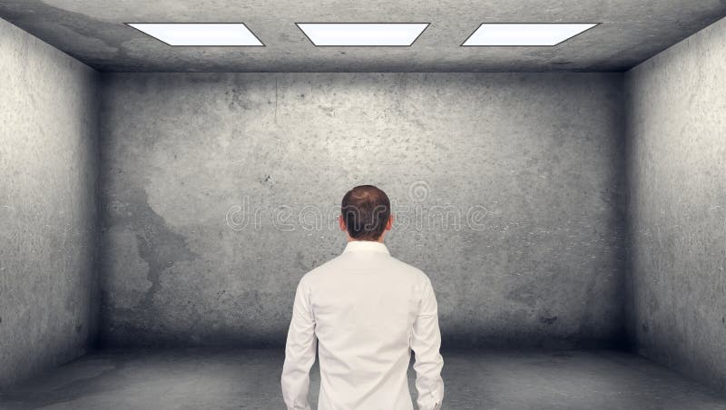 Alone Businessman Looking on Empty Concerete Wall. Stock Photo - Image ...