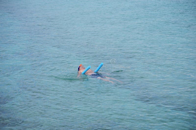 Alone floating in the sea stock image. Image of ocean - 355732445