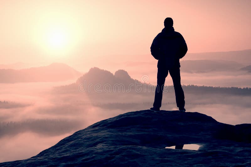 Alone Hiker Standing on Top of a Mountain and Enjoying Sunrise Stock ...