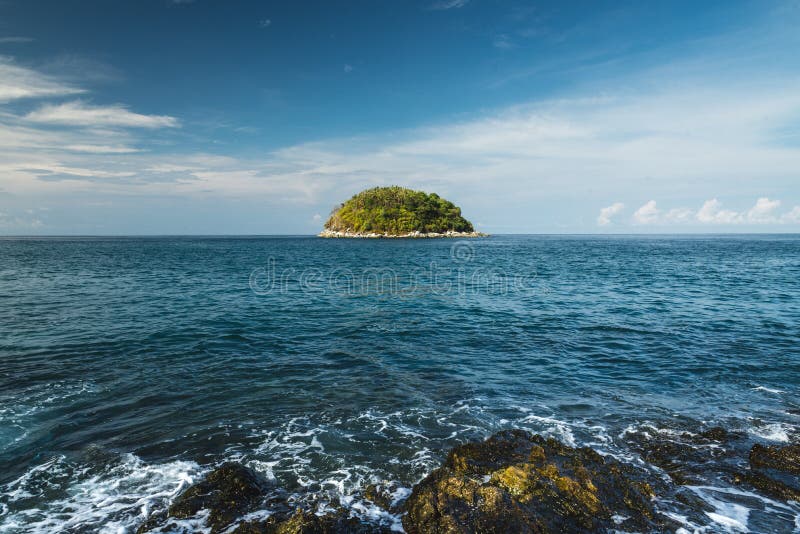 Alone island in the ocean stock photo. Image of meteorology - 28424580