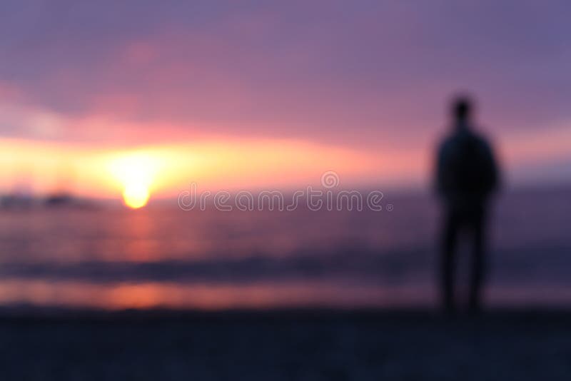 Alone Man Looking at the Sunset on a Beach Stock Image - Image of ...
