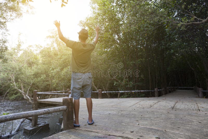 Alone Man Raised Both Hands Up Pray for Blessings To God in Fore Stock ...
