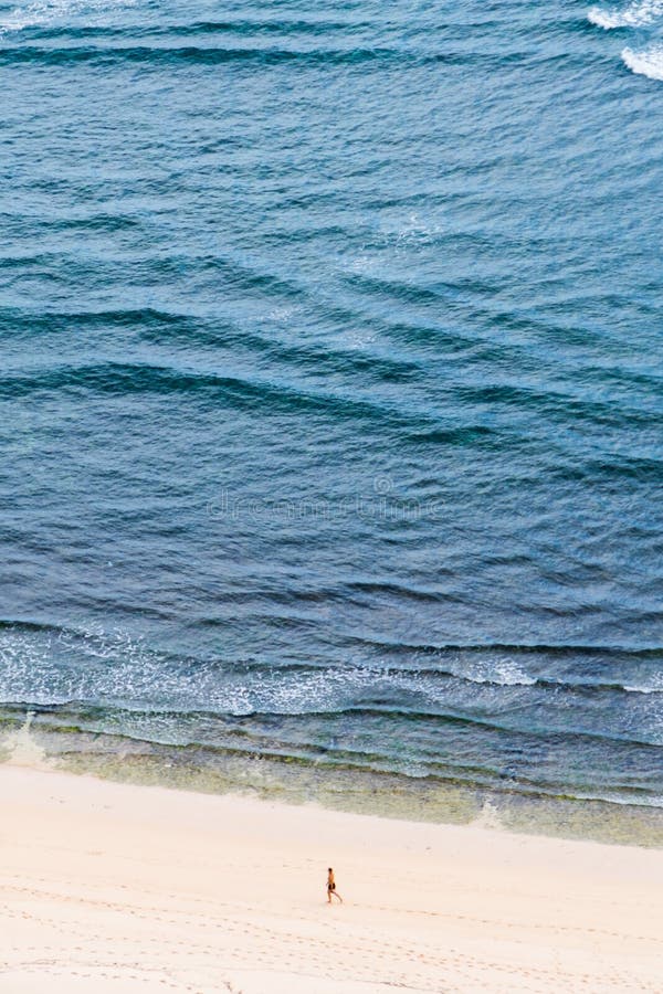 Alone People on the Ocean Sand Beach Editorial Photography - Image of ...