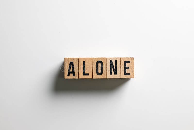 ` Alone ` Text Made of Wooden Cube on White Background Stock Photo ...
