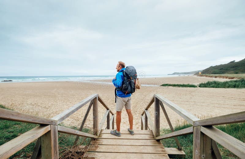 Alone Traveler on the Ocean Beach Stock Image - Image of coast ...