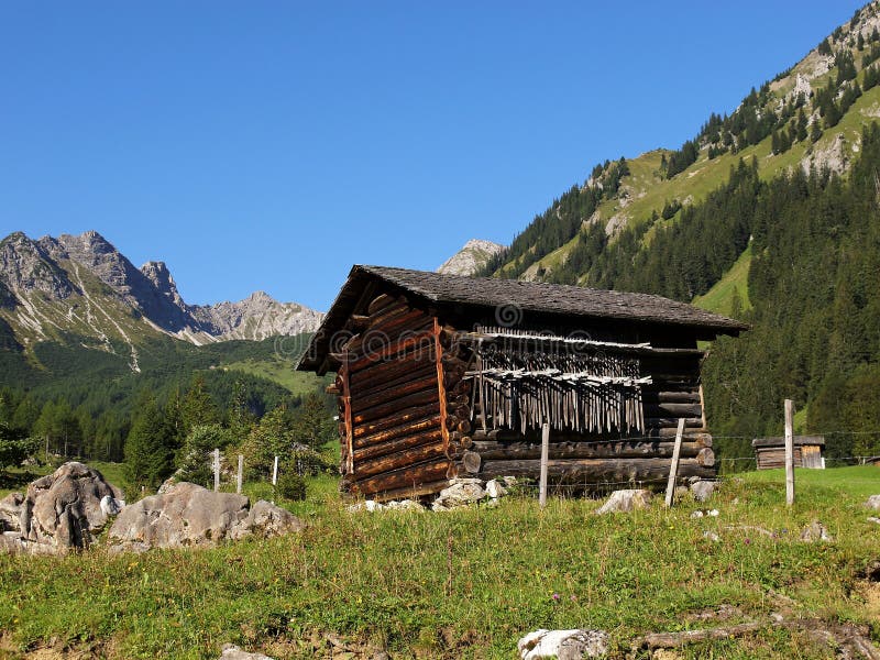 Old swiss hut in mountains stock photo. Image of nature - 3182340