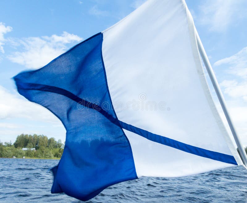 Alpha flag at diving site stock photo. Image of warning - 105418660