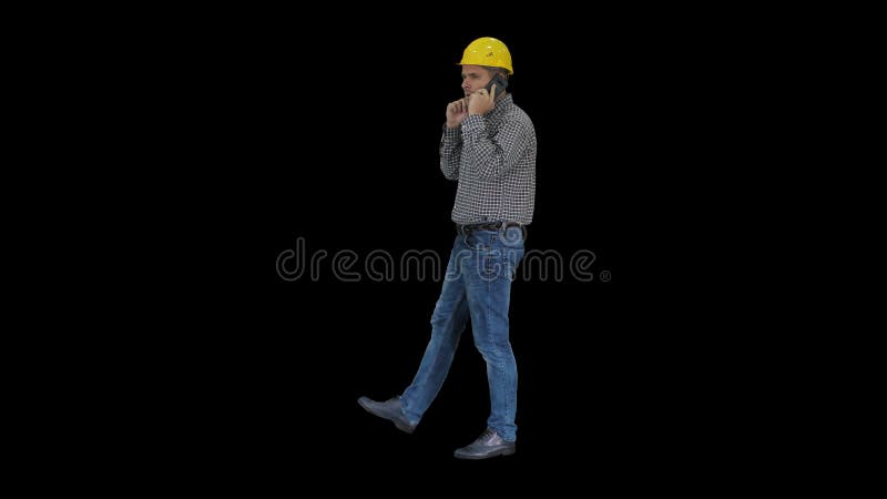 Construction Worker Using Smartphone, Alpha Channel Stock Footage ...