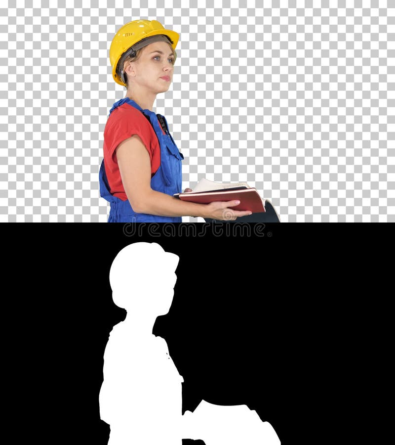 Woman Construction Worker in Hard Hat and Workwear Uniform Checking the ...