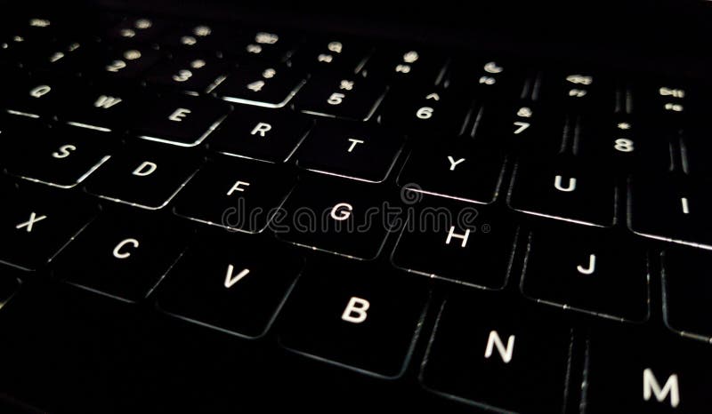 Alphabet Arrangement on a Keyboard with Lights on at Night Stock Image ...