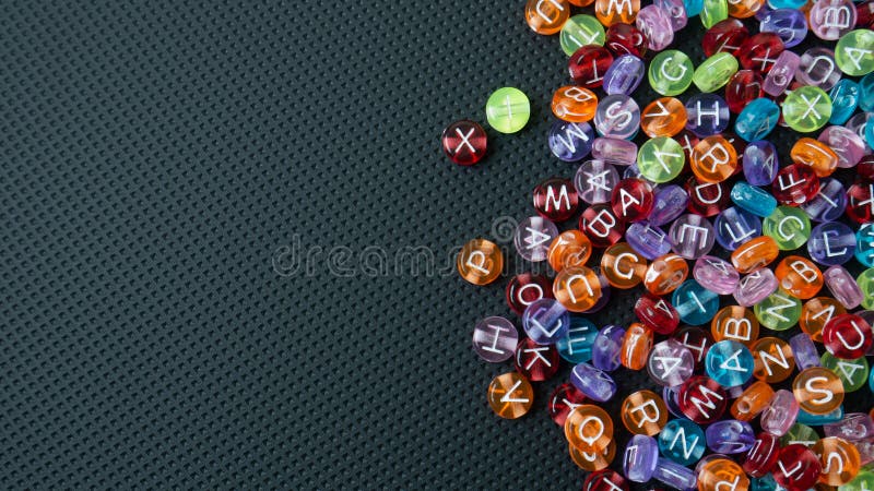 The Alphabet Bead Multi Color on Black Background for Education Concept ...