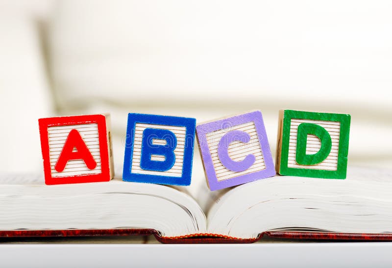 Alphabet Block with ABCD on Book Stock Photo - Image of english ...