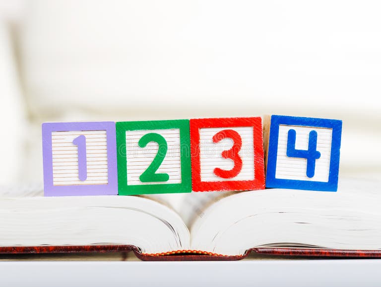 Alphabet Block with 1234 on Book Stock Photo - Image of number, wooden ...