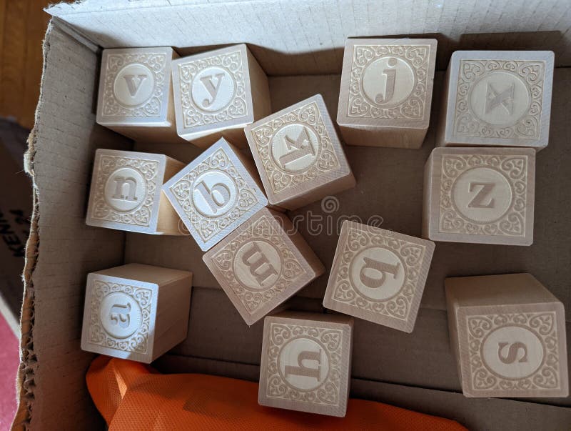 Alphabet blocks in box stock image. Image of label, cardboard - 269542777