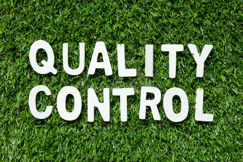 Alphabet Letter in Word Quality Control on Green Grass Background Stock ...