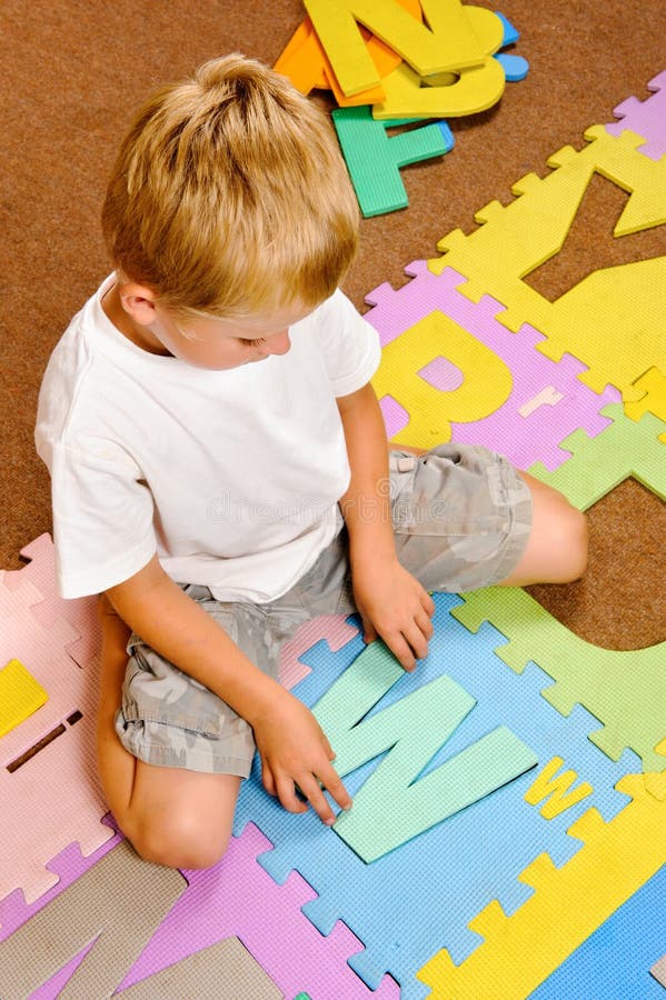 Alphabet mat cutout stock photo. Image of casual, activity - 18402100