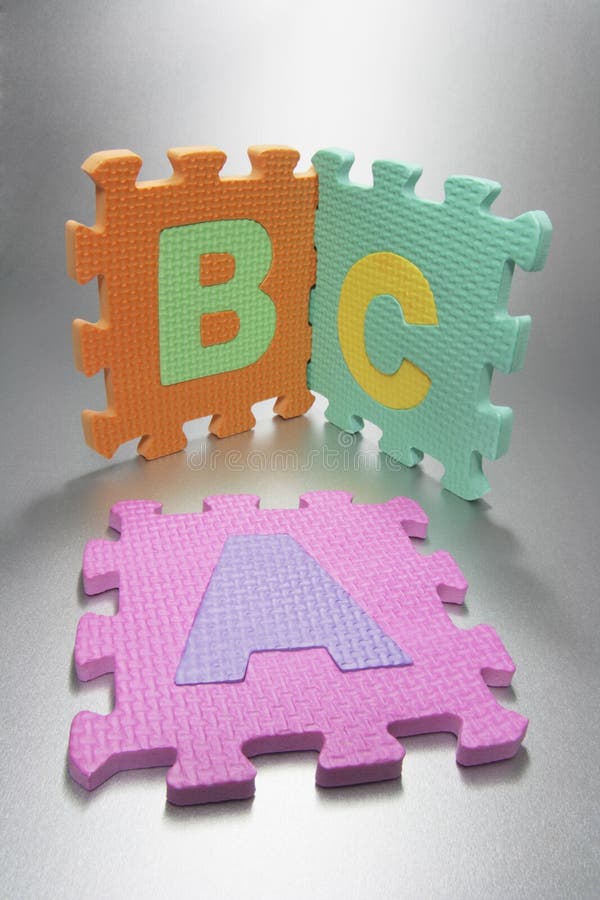 Alphabet Puzzles stock image. Image of alphabets, puzzles - 129095779