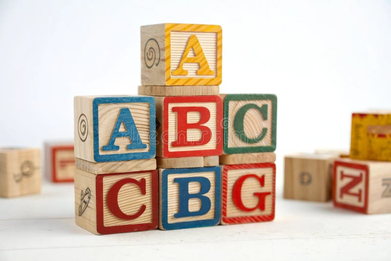 Alphabet Wooden Bricks Tower â€ ABC Blocks Wall Isolated Stock ...