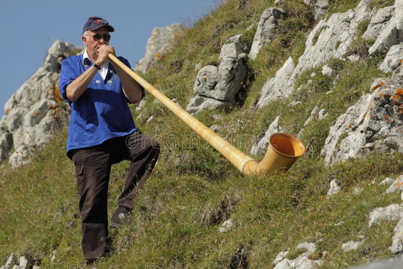 Alphorn player editorial photo. Image of alpine, local - 20906091