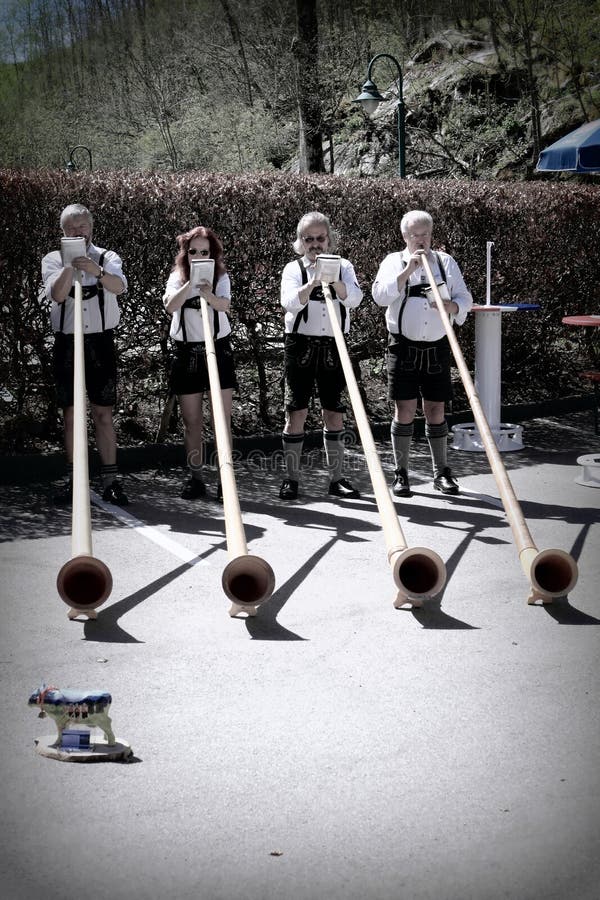 Alphorn players in Germany editorial stock photo. Image of costumes ...