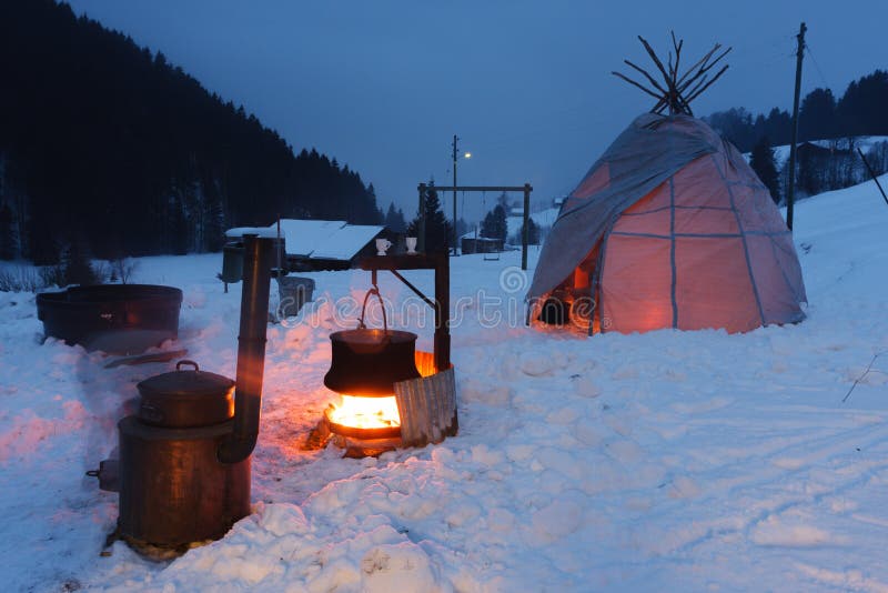 Alpine Cheese Making Pot with Tipi Tent and Stove Stock Photo - Image ...