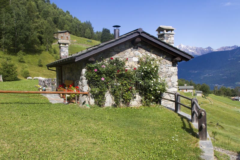 Alpine cottage stock image. Image of summer, mountain - 35195933
