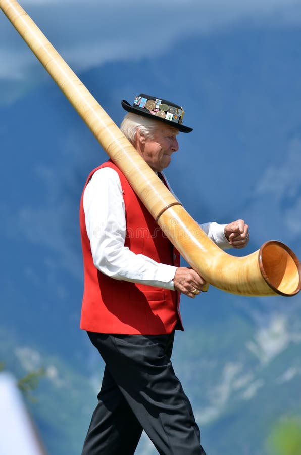 Alpine Horn Festival editorial photo. Image of alps, costume - 25808996