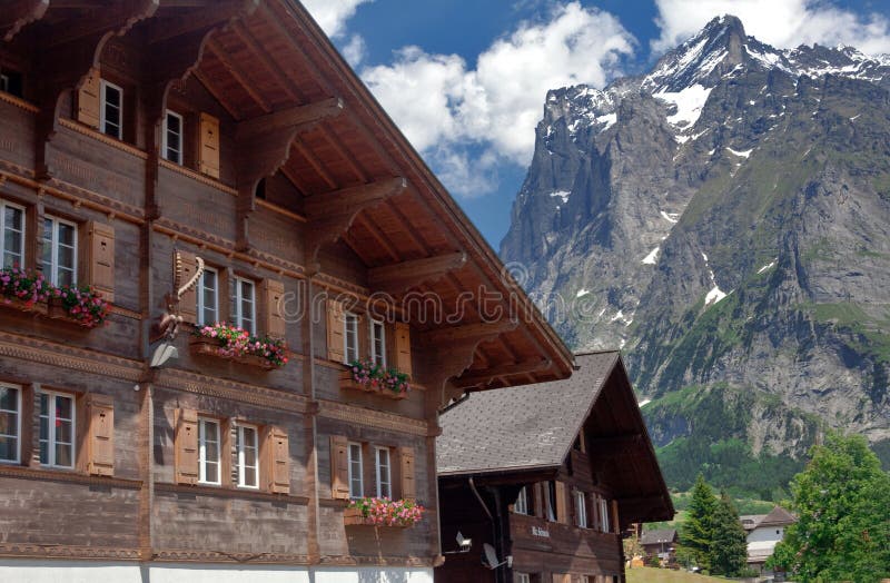 Alpine House, Mountains and Sky Stock Image - Image of field, grass ...