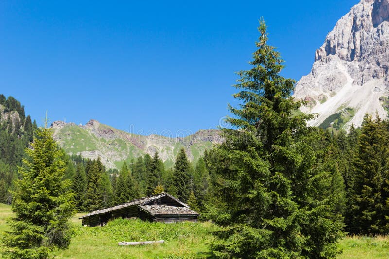Alpine hut in mountain stock image. Image of view, mountains - 77211081