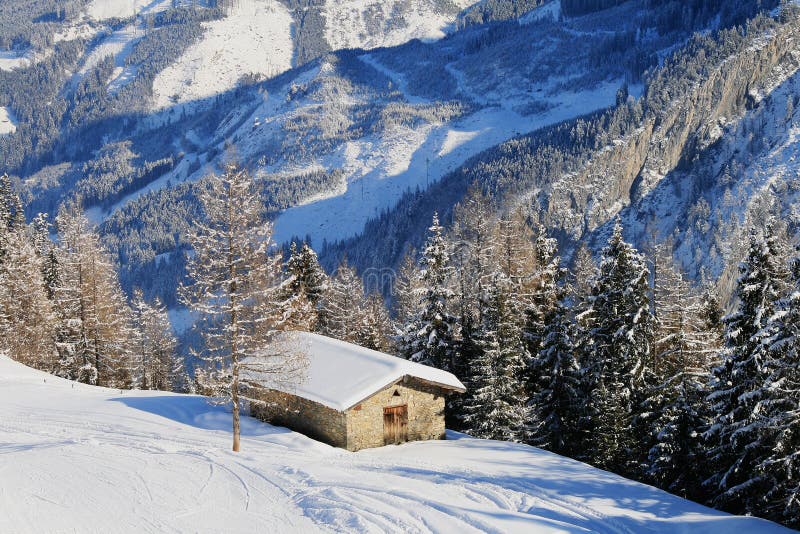 Alpine Hut in Winter. Roof Covered with a Layer of Snow Stock Image ...