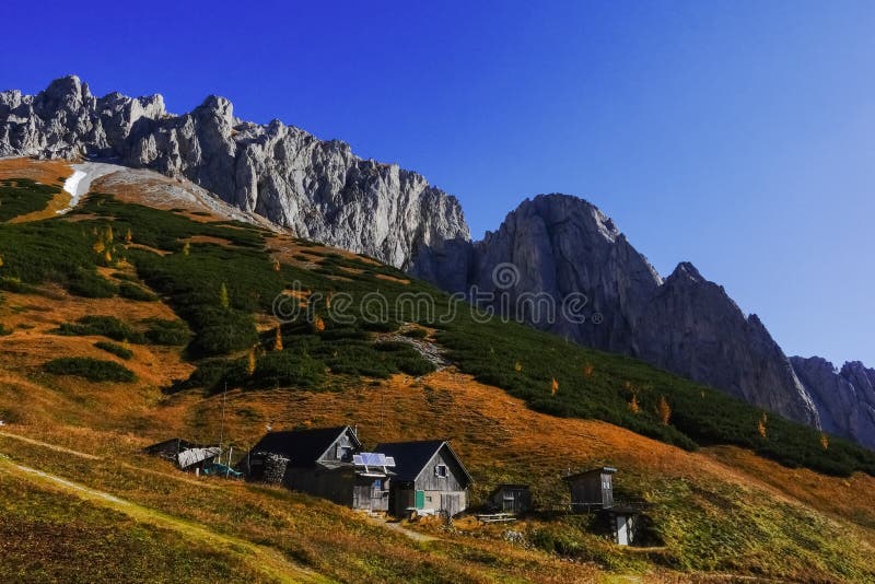 Alpine Huts in the Middle from a Mountain Range in Austria Stock Photo ...