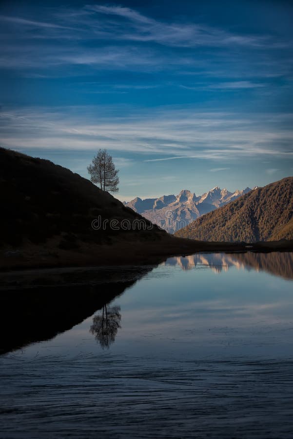 Alpine lake stock image. Image of mountain, alps, house - 47599865