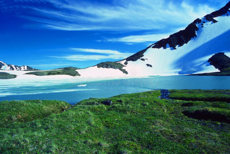 Alpine Lake at a Mountain Pass Stock Photo - Image of alaska, mountains ...