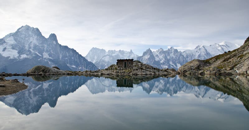 Alpine lake reflection stock photo. Image of chamonix - 27182090