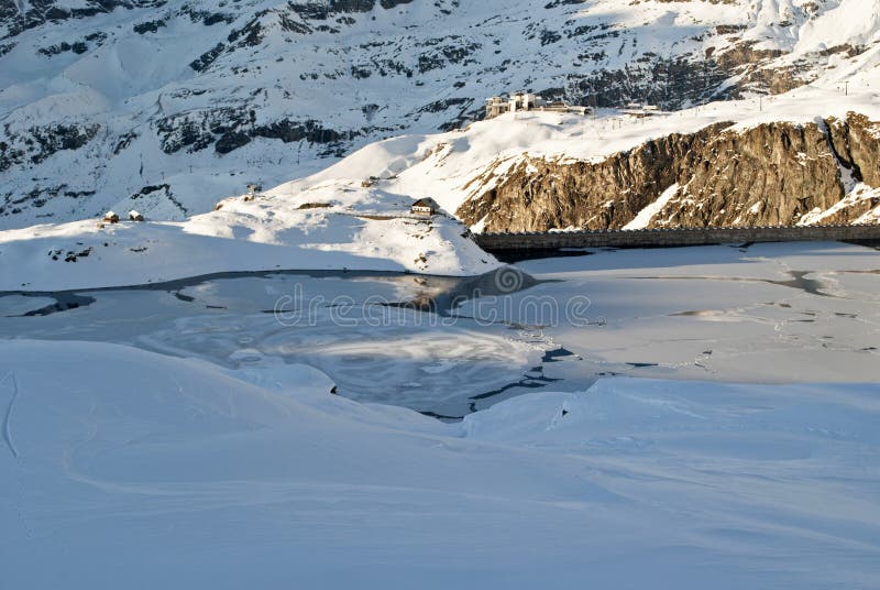 Alpine lake stock photo. Image of cervinia, peak, ridge - 31328268