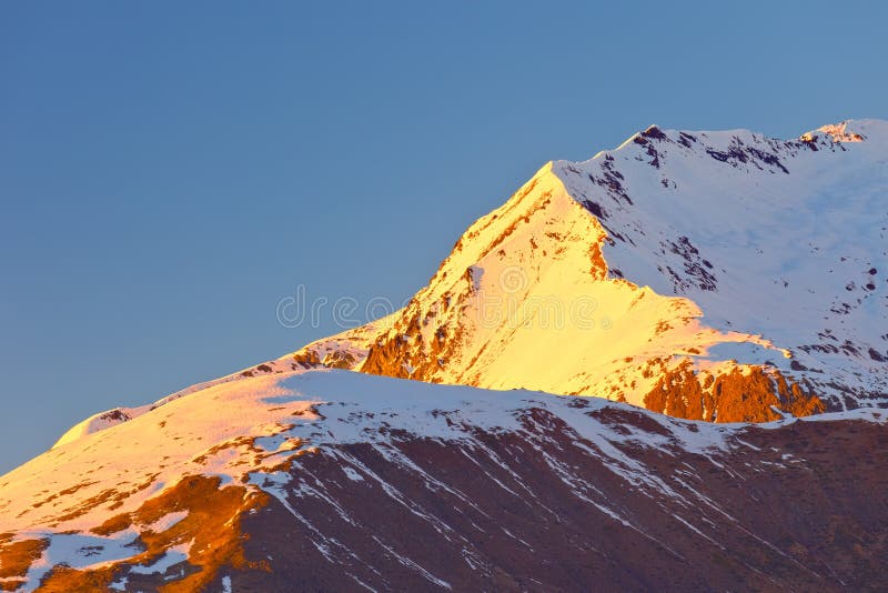 Alpine peak at sunset stock photo. Image of french, european - 21730096