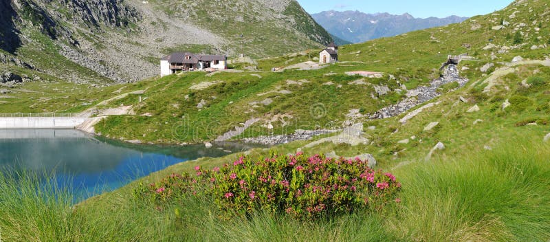 Alpine refuge on the lake stock photo. Image of alps - 16166856