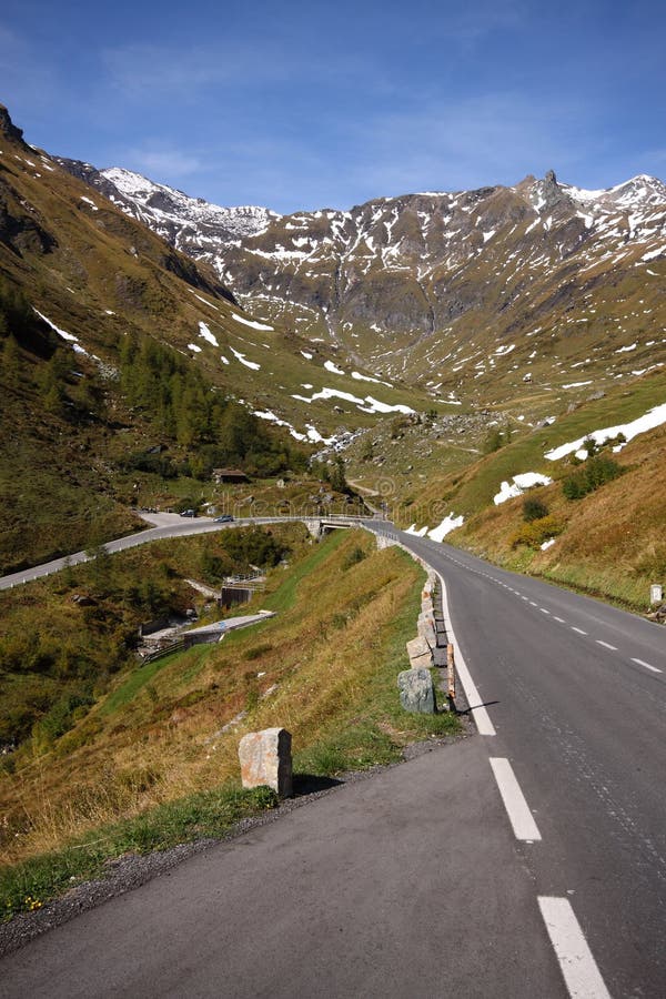 Alpine road curve stock image. Image of beautiful, hill - 21983447