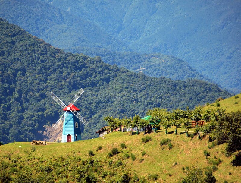 Alpine Scenery with a Windmill Stock Photo - Image of forest, quiet ...