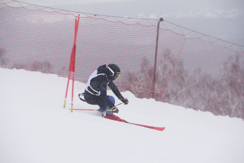 Alpine ski race skier gate stock photo. Image of piste - 211966694