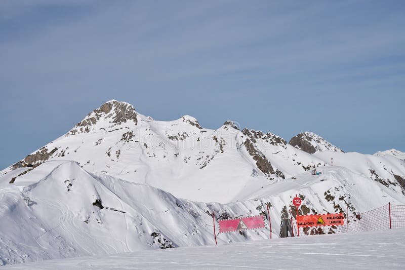Alpine Ski Slope and Warning Signs Stock Image - Image of signage ...